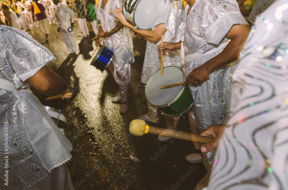 Street carnival. Band, musicians, people playing samba seen up close ...