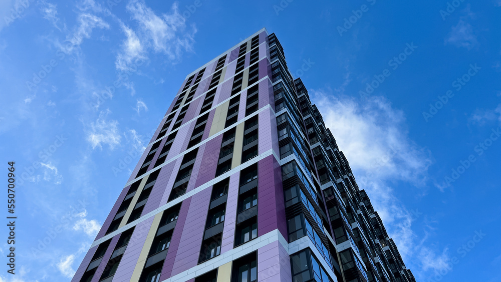 The facade of the building in purple,geometric patterns from windows ...