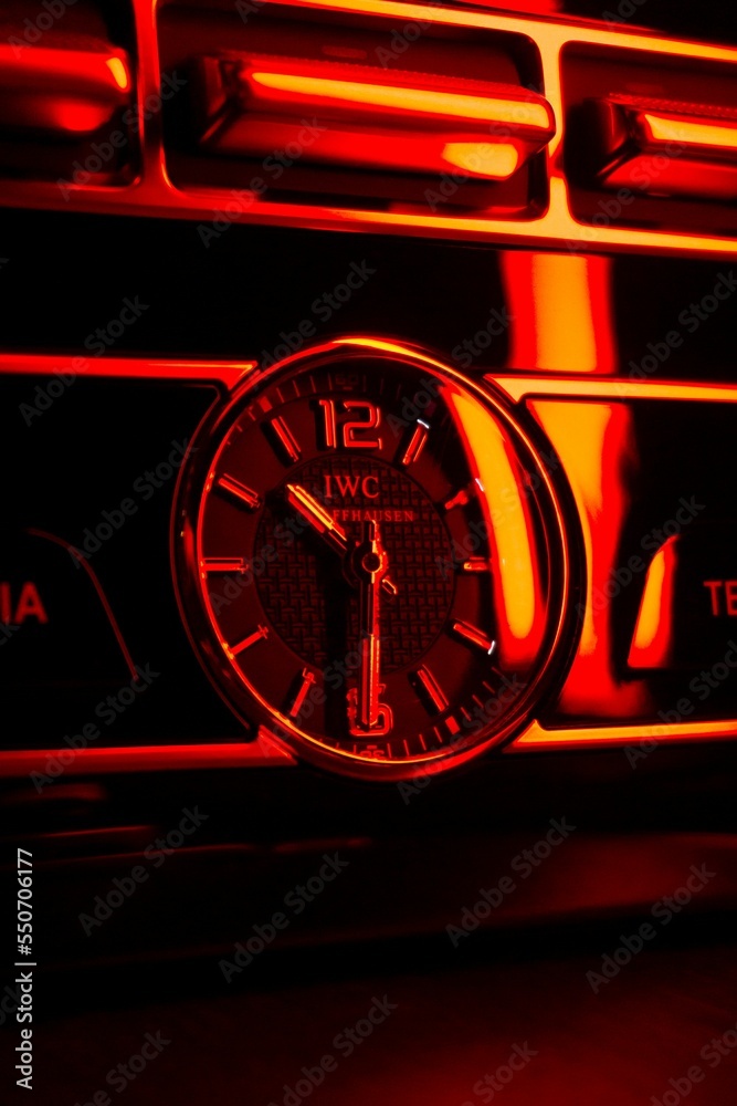 Vertical closeup of the Mercedes-Benz AMG dashboard analog clock under ...