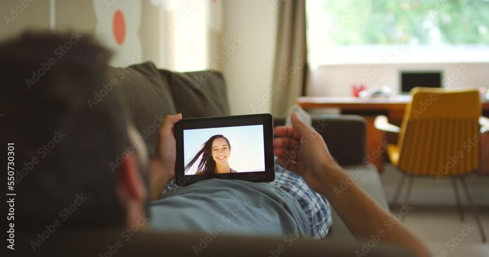 Man, tablet and couple doing video call on screen for talking, bonding ...