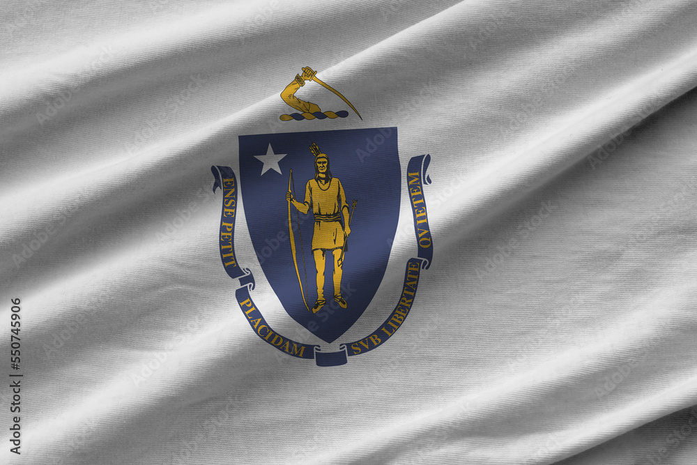 Massachusetts US state flag with big folds waving close up under the ...