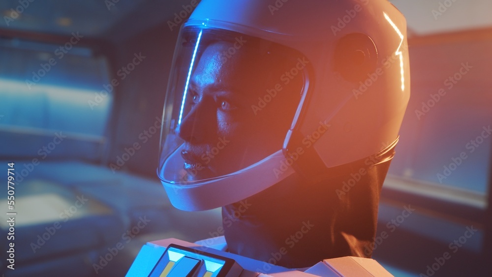 A woman astronaut in a space suit aboard the orbital station. A young ...