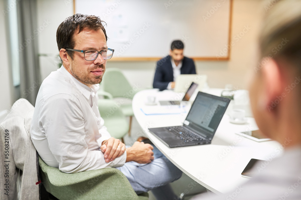 Business man as programmer or software developer Stock Photo | Adobe Stock
