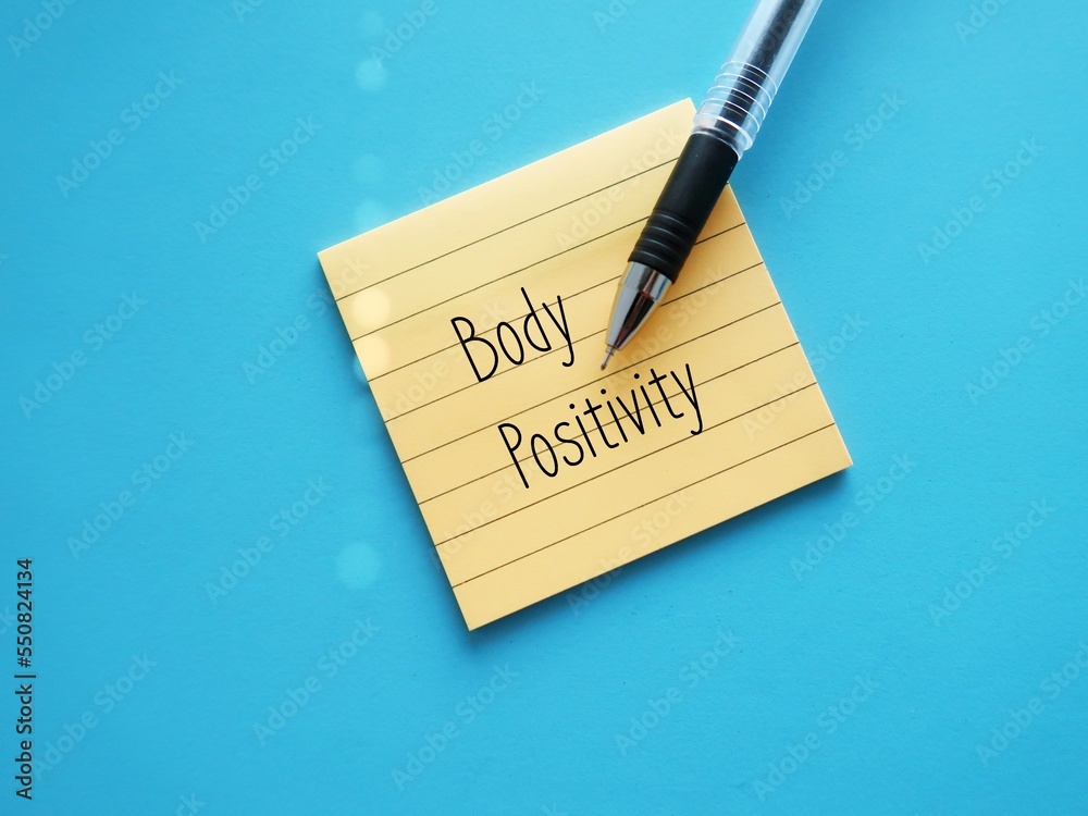 Note on blue background with handwritten text BODY POSITIVITY, the ...