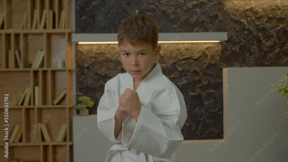 Portrait of motivated adorable multiracial elementary age athlete kid ...