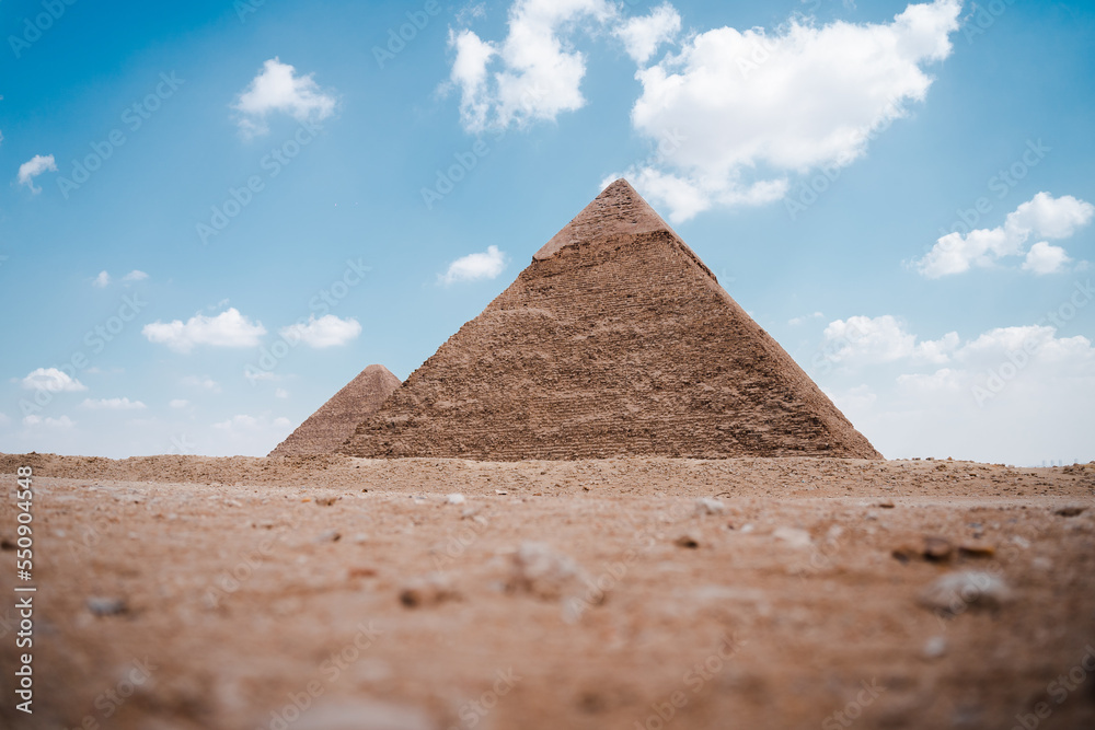 Ancient Egyptian pyramids in desert on sunny day Stock Photo | Adobe Stock