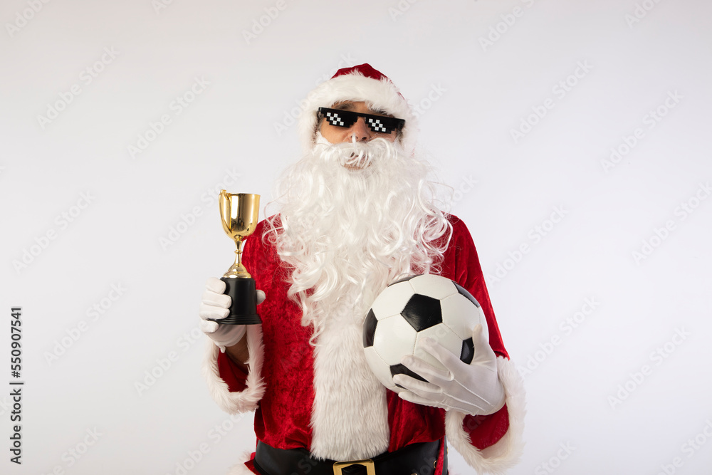 santa claus with sunglasses "thug life" soccer ball and a trophy in his ...