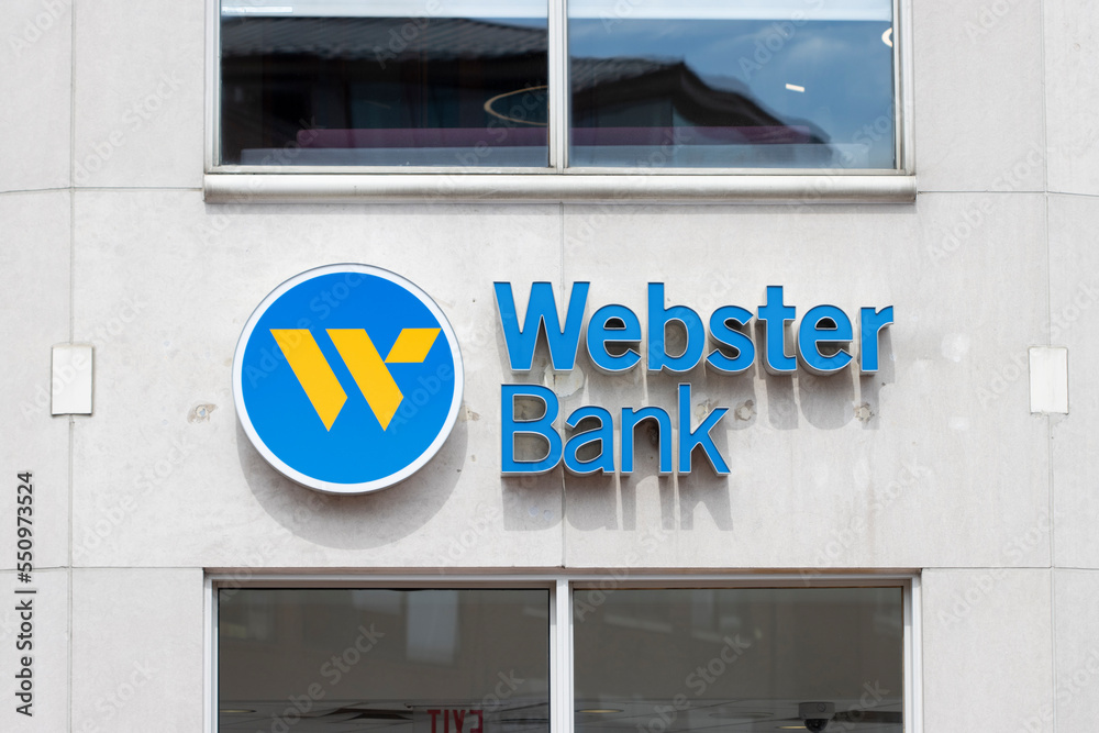 Cambridge, MA, USA - June 29, 2022: Webster Bank logo is seen at one of ...