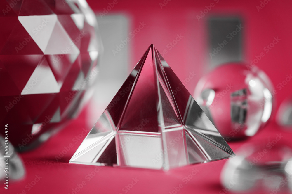 Crystal prism refracting light, magic crystals and pyramid, sphere and ...