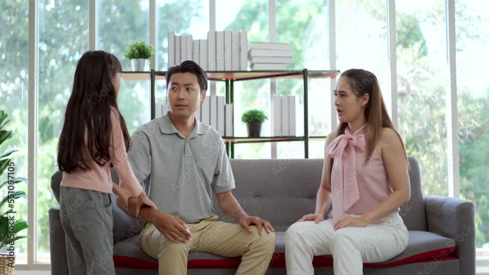 Unhappy family and issue. A little girl crying during her mother and ...