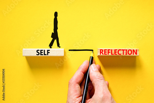 Self reflection symbol. Concept word Self reflection typed on wooden ...