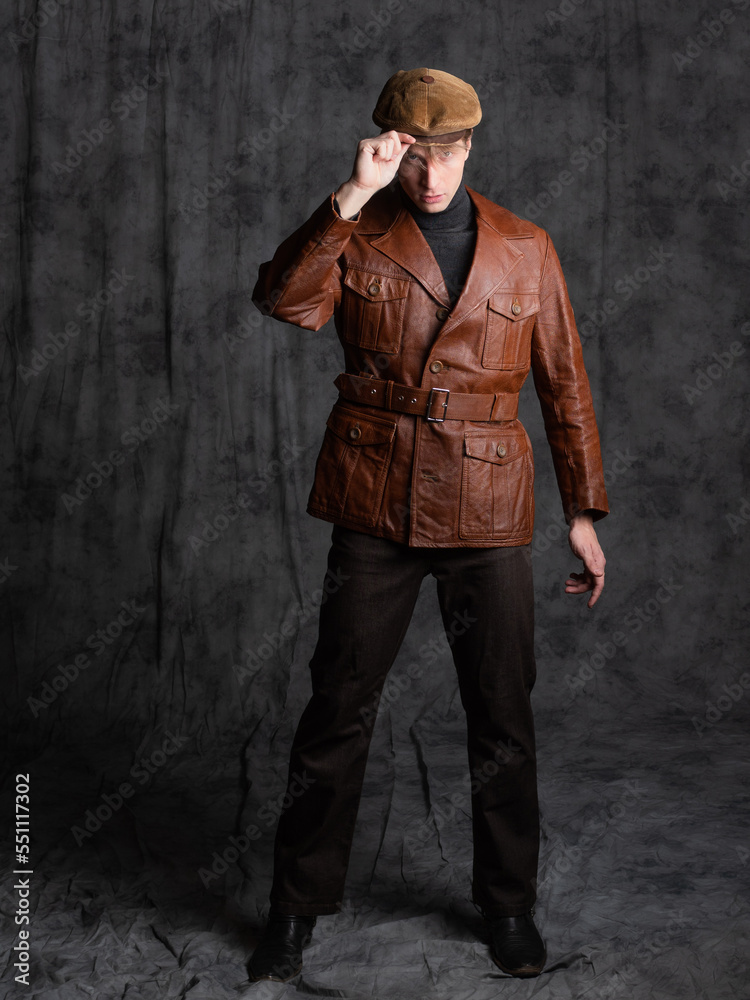 young man, a retro secret agent, a guy in a brown leather jacket and a ...