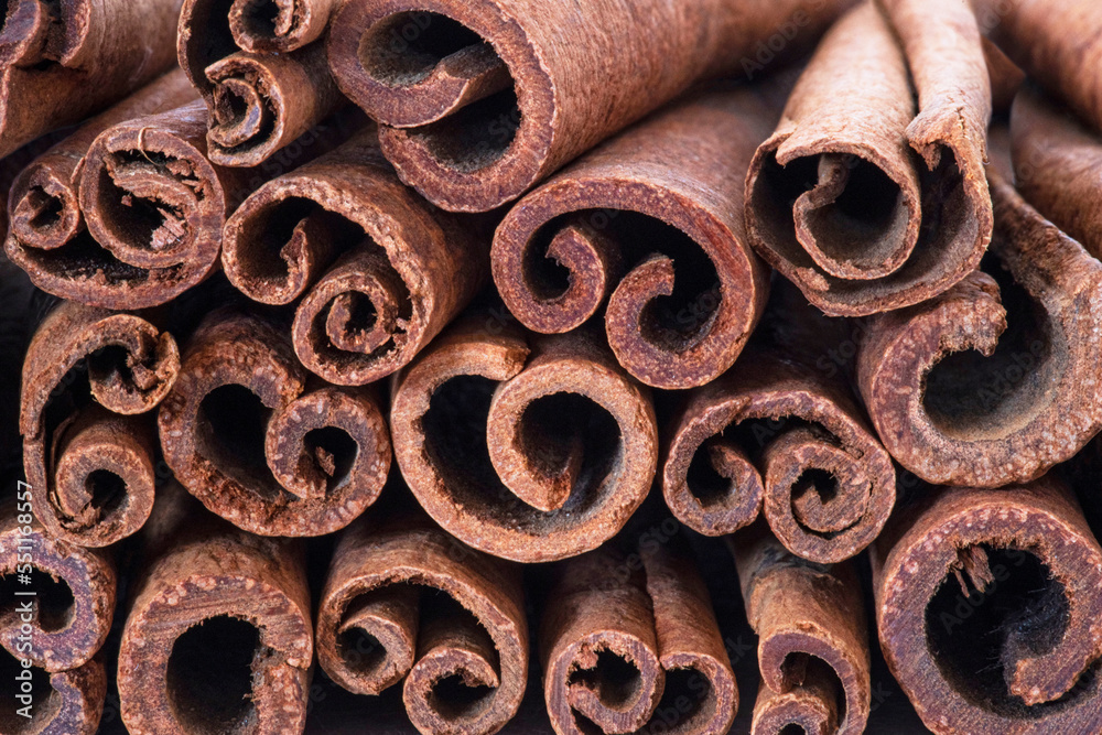 texture of brown cinnamon sticks in a pile Stock Photo | Adobe Stock