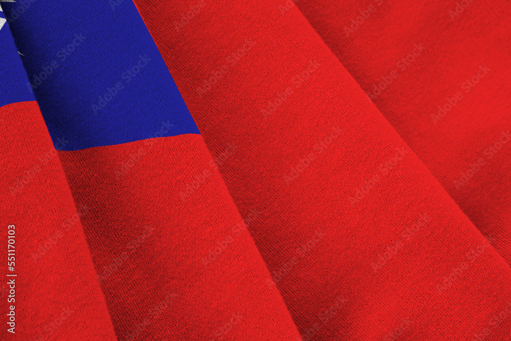 Taiwan flag with big folds waving close up under the studio light ...