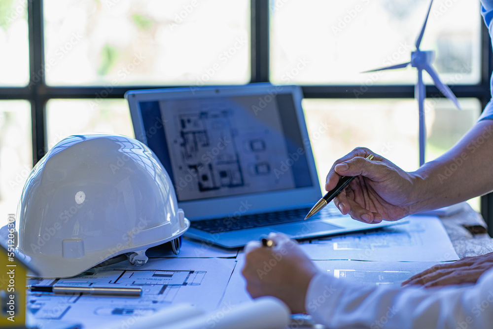 Professional design engineers discuss calculations to use pure natural ...