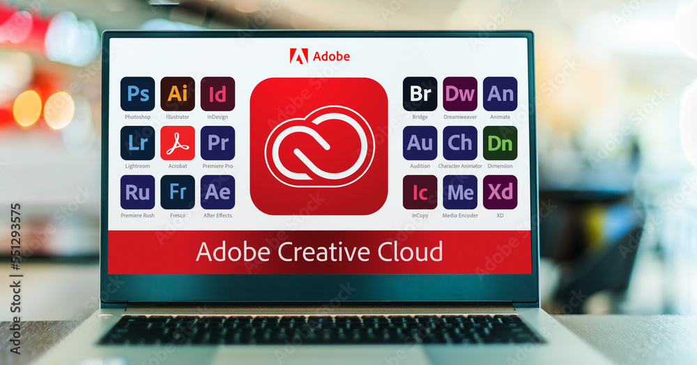 Laptop computer displaying logotypes of Adobe Creative Cloud Stock ...
