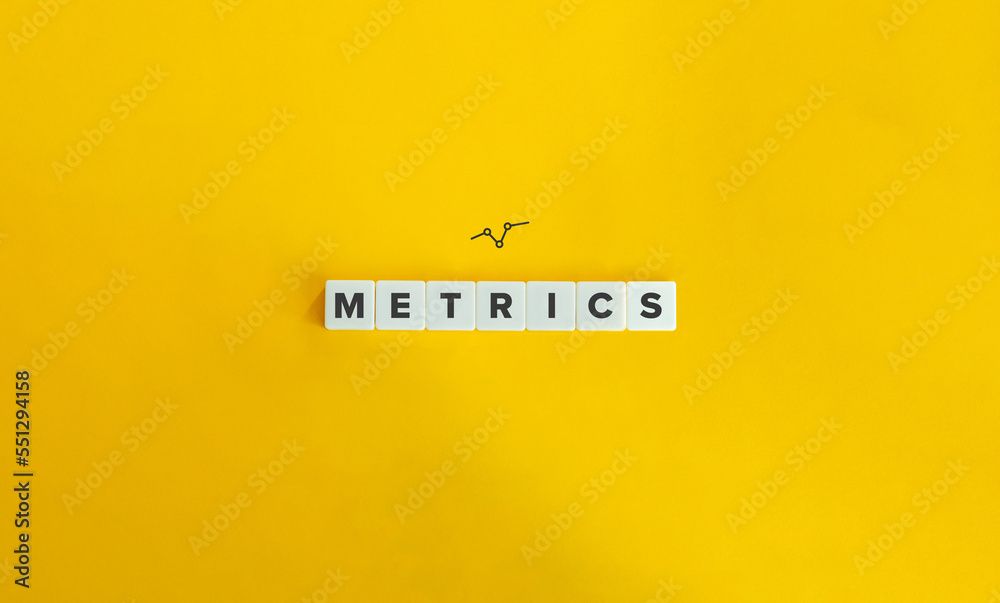 Metrics Banner, Icon, and Word on Block Letter Tiles on Yellow ...