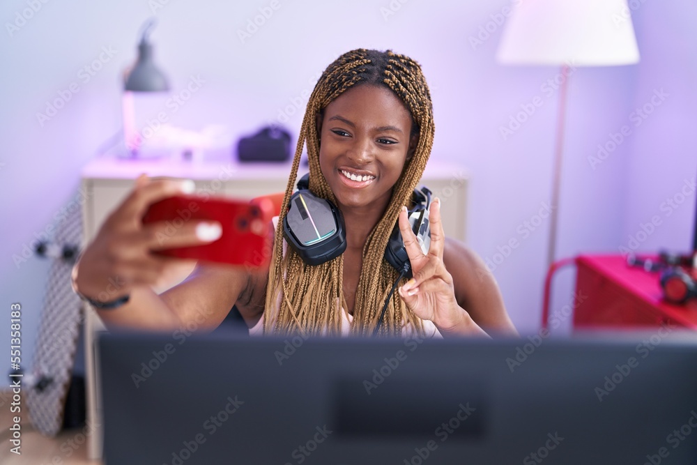 African american woman streamer smiling confident make selfie by ...