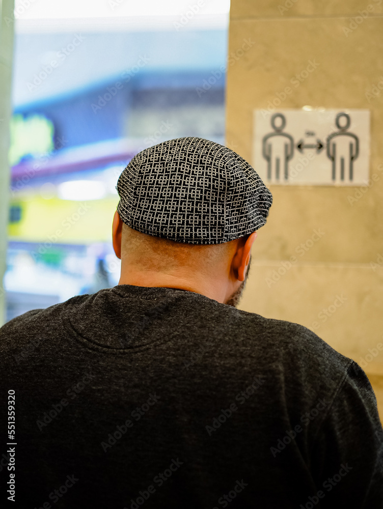 Adult man bald head rear back view. Man bald head wearing a hat. Human ...