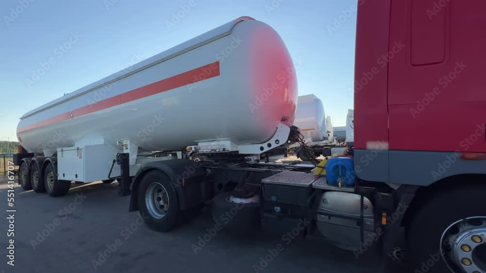 Gasoline tankers (Tanker truck, gas truck, fuel truck) stand in the ...