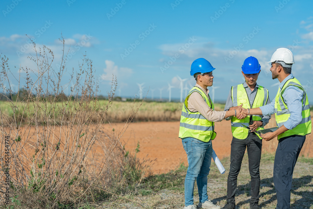 Asian engineers working in fieldwork outdoor. Workers walking and ...