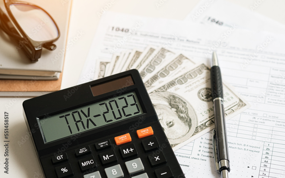 Tax 2023. Word Tax 2023 on calculator. Business and tax concept ...