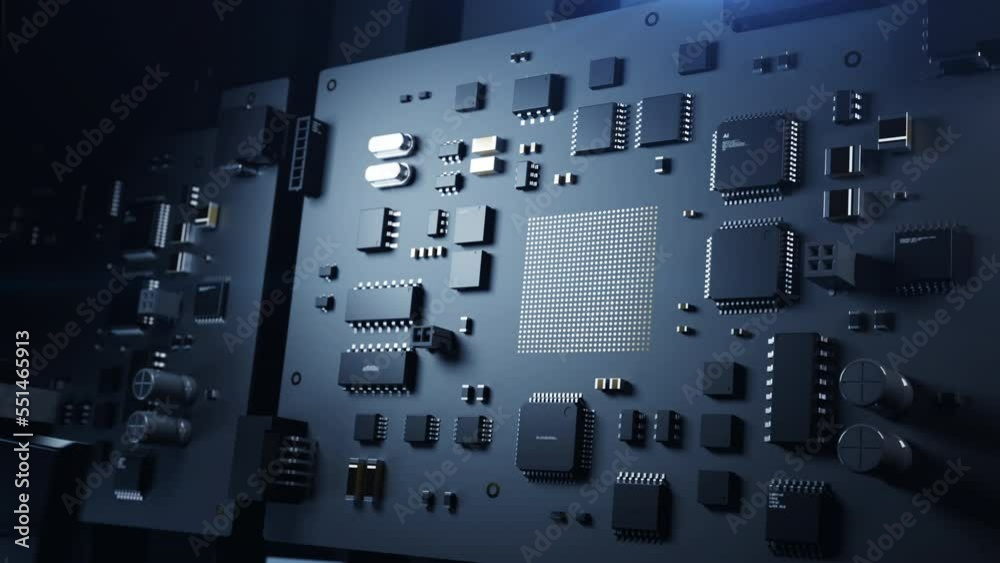 a robotic arm inserts a CPU on a printed circuit board with the ...