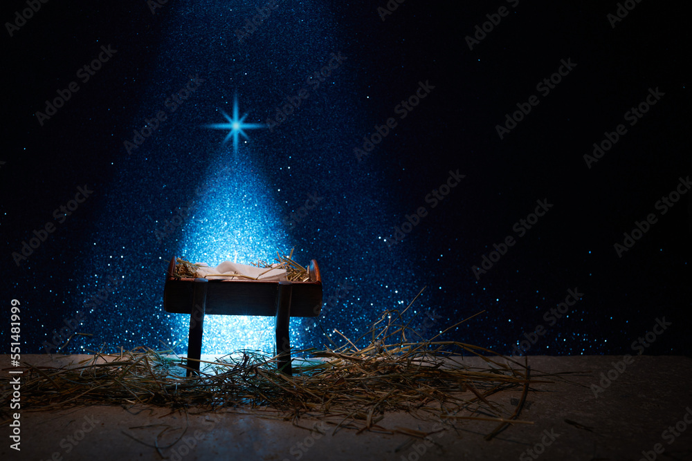Nativity of Jesus, empty manger at night with bright lights. Stock ...