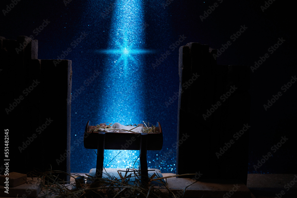 Nativity of Jesus, empty manger at night with bright lights. Stock ...
