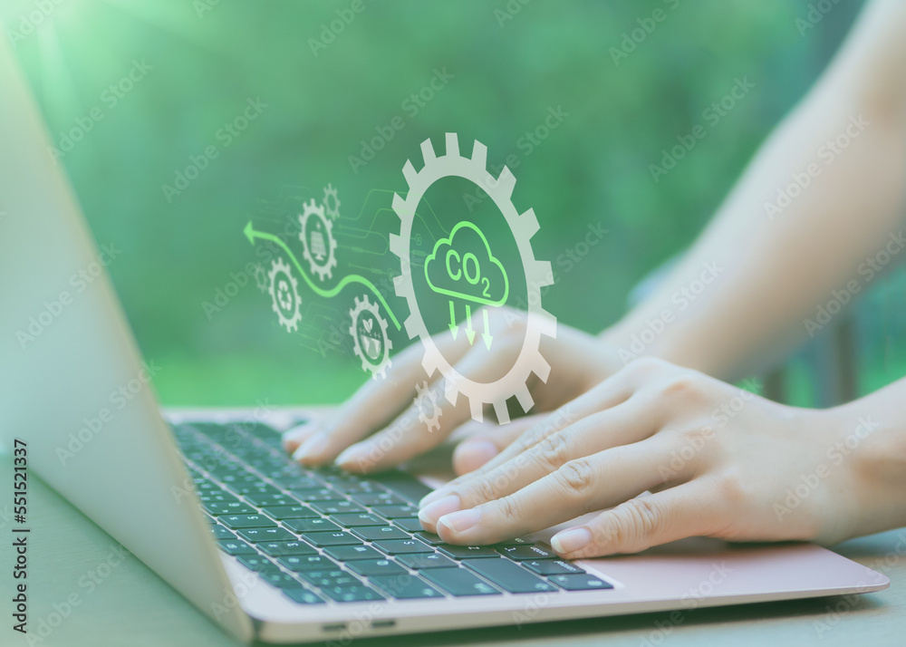 Reduce CO2 emission concept. Woman using laptop for working technology ...
