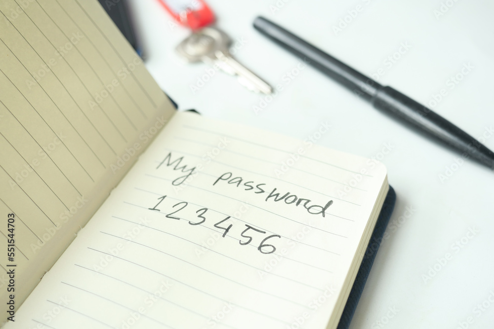 writing password on a sticky note Stock Photo | Adobe Stock