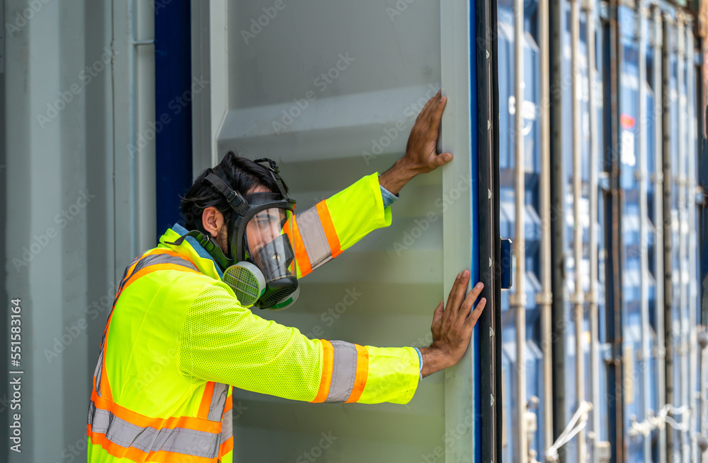 Engineer wear PPE checking inside container as Chemical spill in the ...
