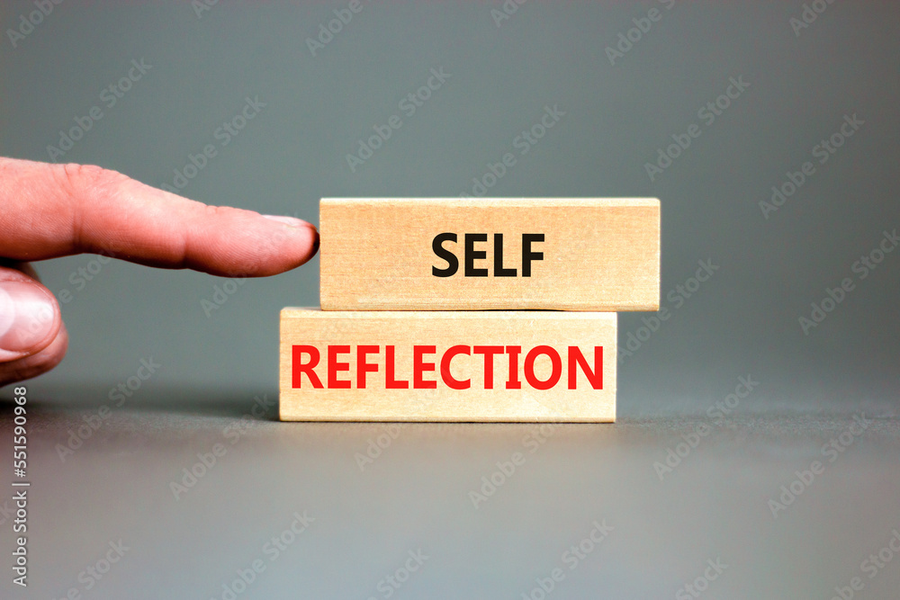 Self reflection symbol. Concept word Self reflection typed on wooden ...