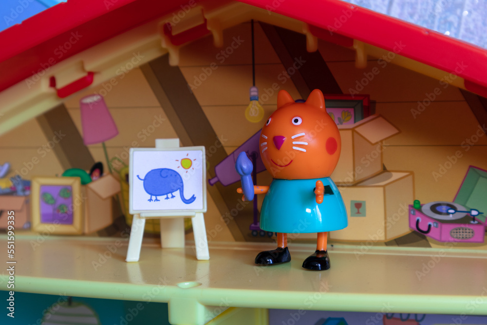 Peppa Pig's toy house. Candy the cat is painting a picture in the attic ...