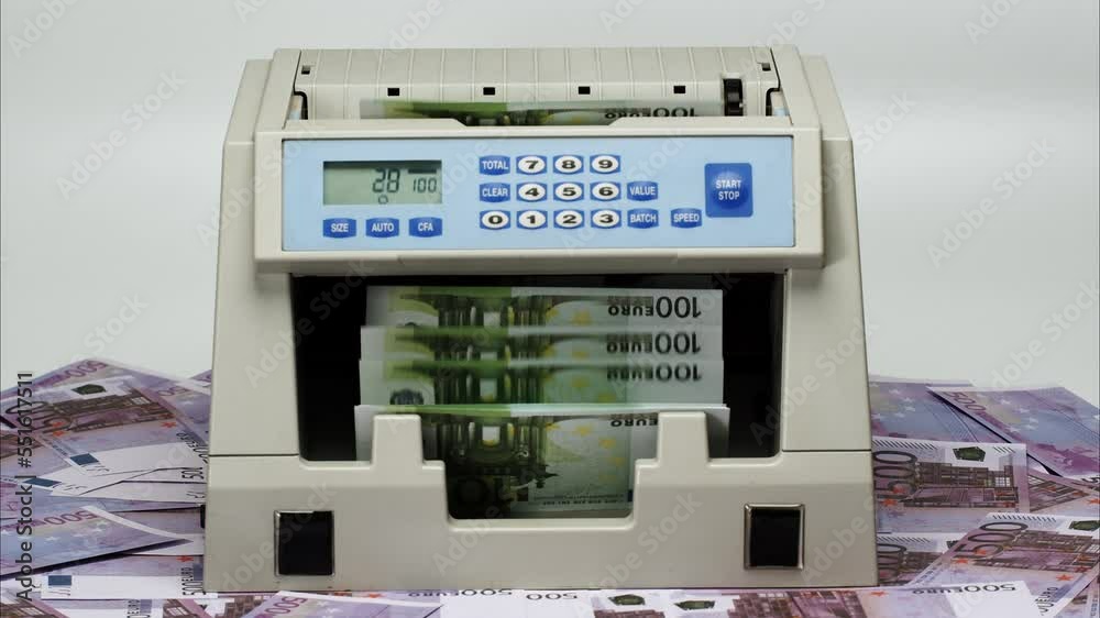 Calculating machine for money counting one hundred euro close-up. Bills ...