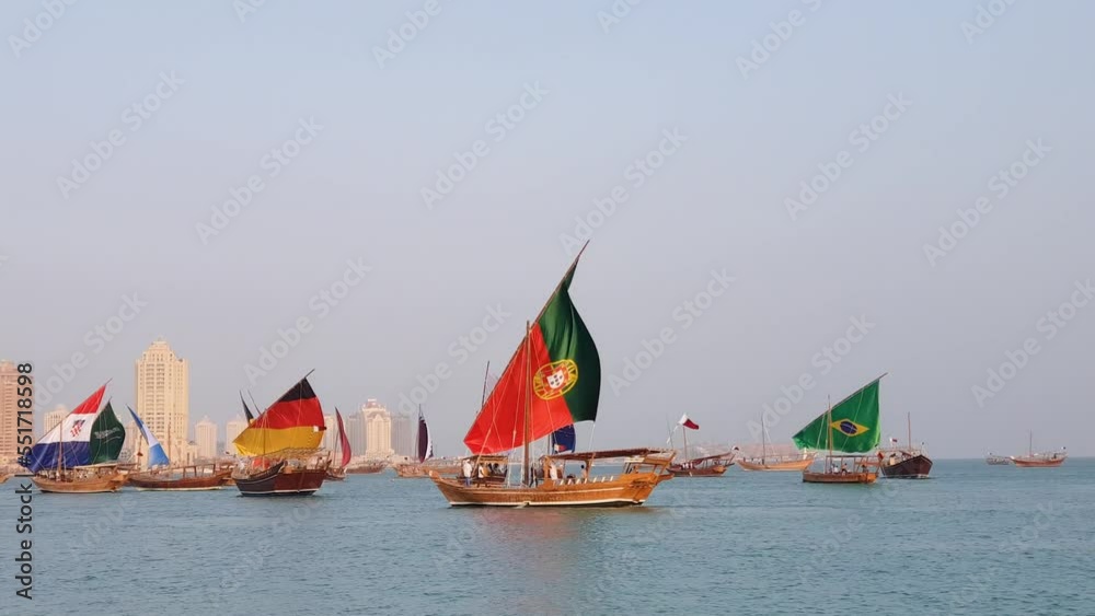 Vidéo Stock Sailing traditional lenj boat ship with country flag sail ...