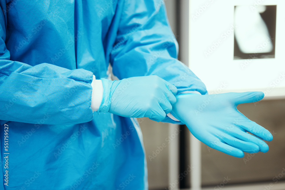 Healthcare, scrubs and surgeon hands with gloves for protection in ...