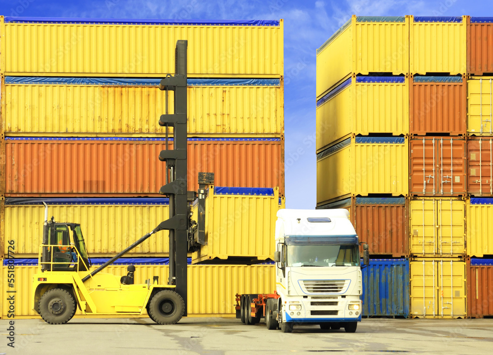 Tall stacks of long shipping containers on a loading dock Stock Photo ...