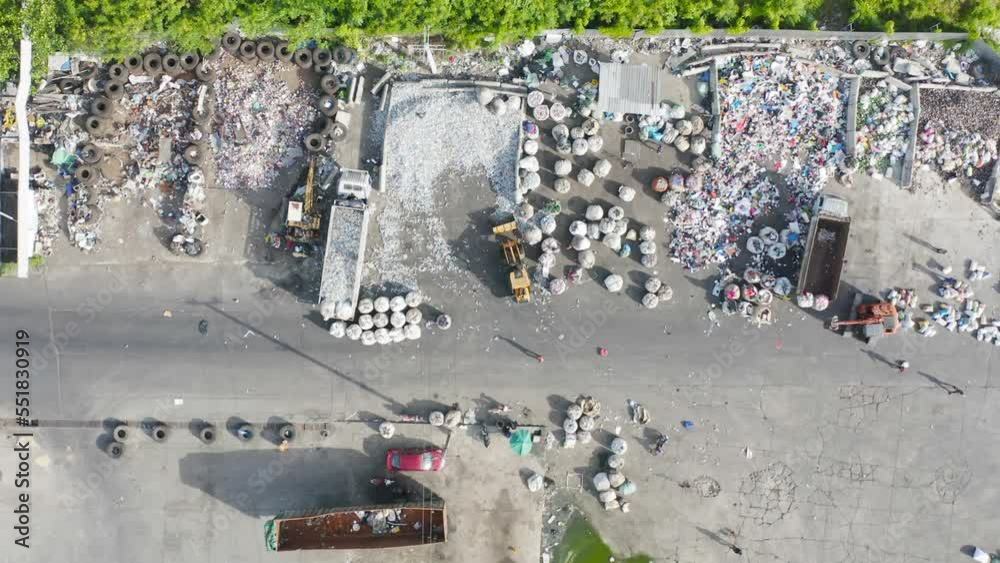 Aerial view of stack of different types of large garbage pile, plastic ...
