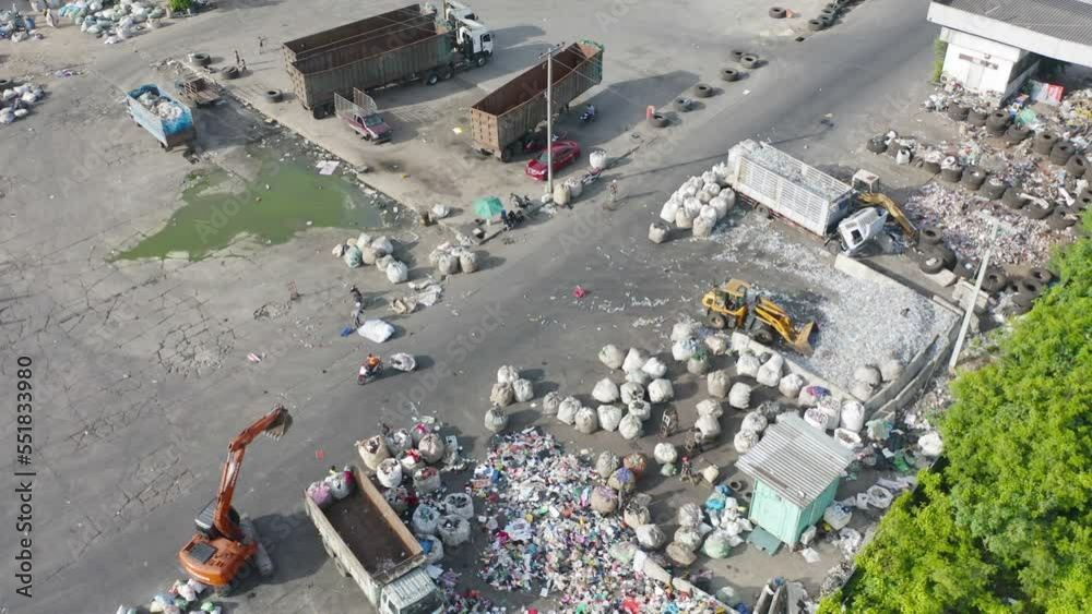 Aerial view of stack of different types of large garbage pile, plastic ...