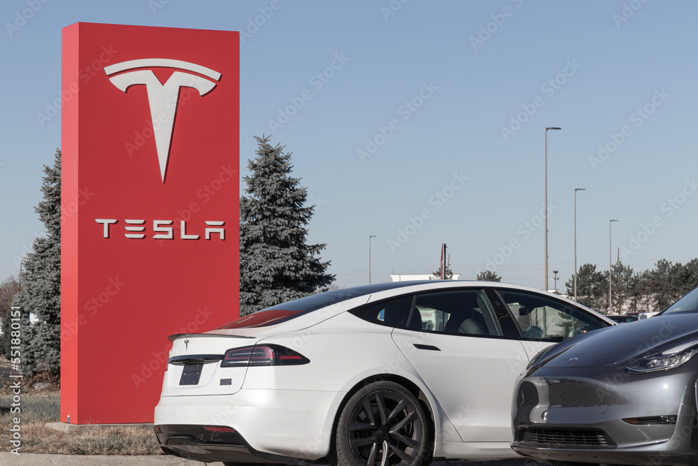 Tesla EV electric vehicles on display. Tesla products include electric ...