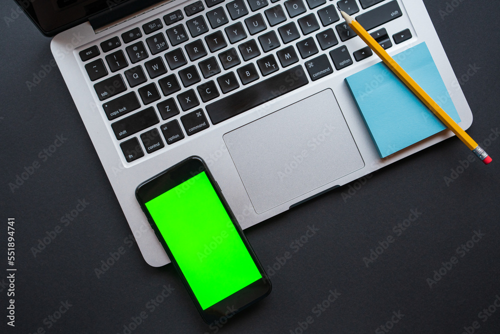 Office desk table laptop computer and office supplies, yellow pencil ...