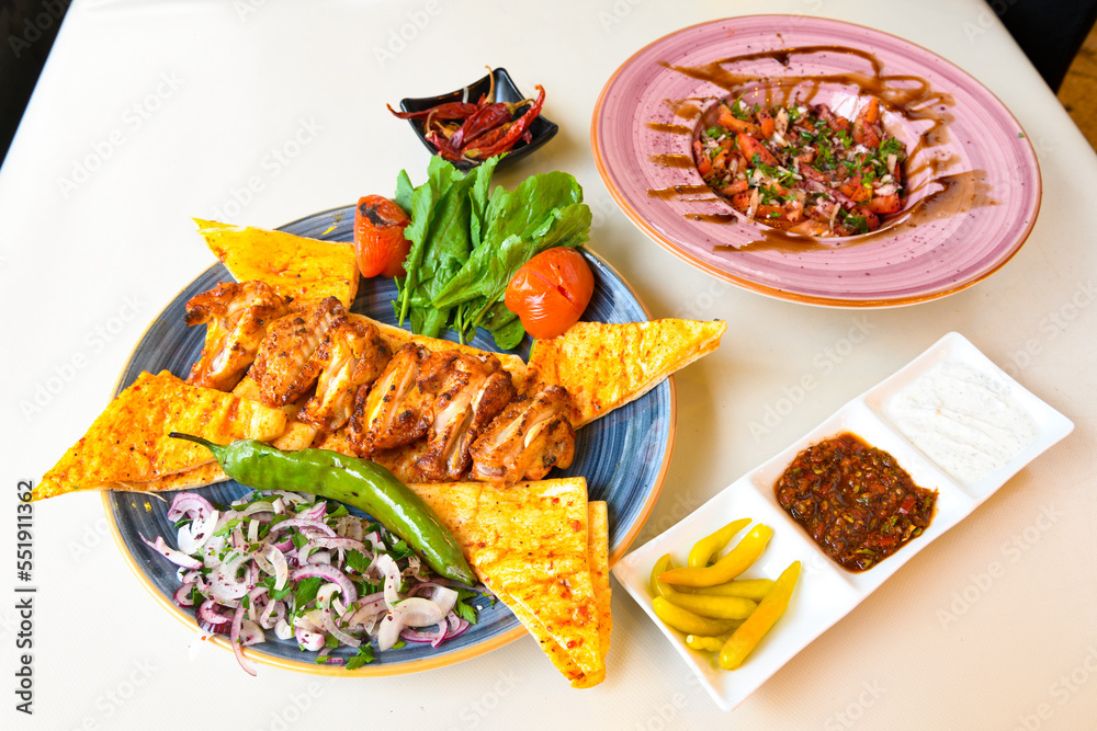 Chicken wings barbeque in a dish with BBQ grill sauce . Izgara tavuk ...