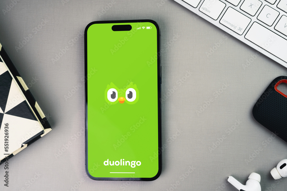 Duolingo language-learning app on the smartphone screen on grey ...