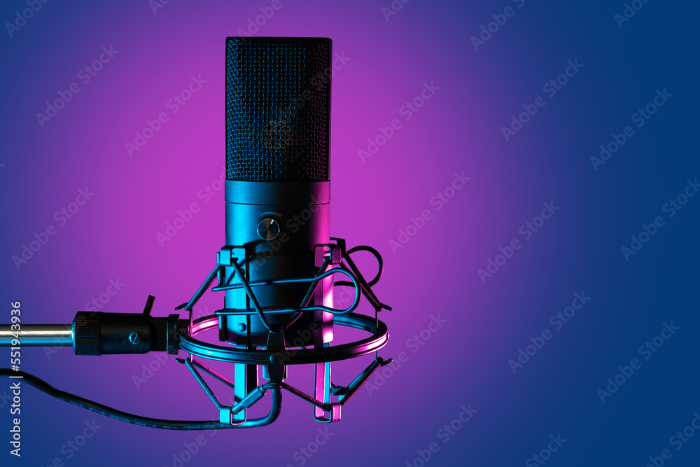 Concert microphone close-up. Mike is mounted on tripod. Condenser mike ...