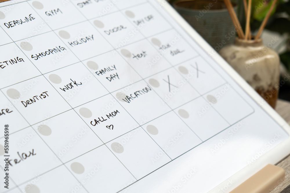 Monthly PLANNER filled with appointments and plans for next month. Busy ...