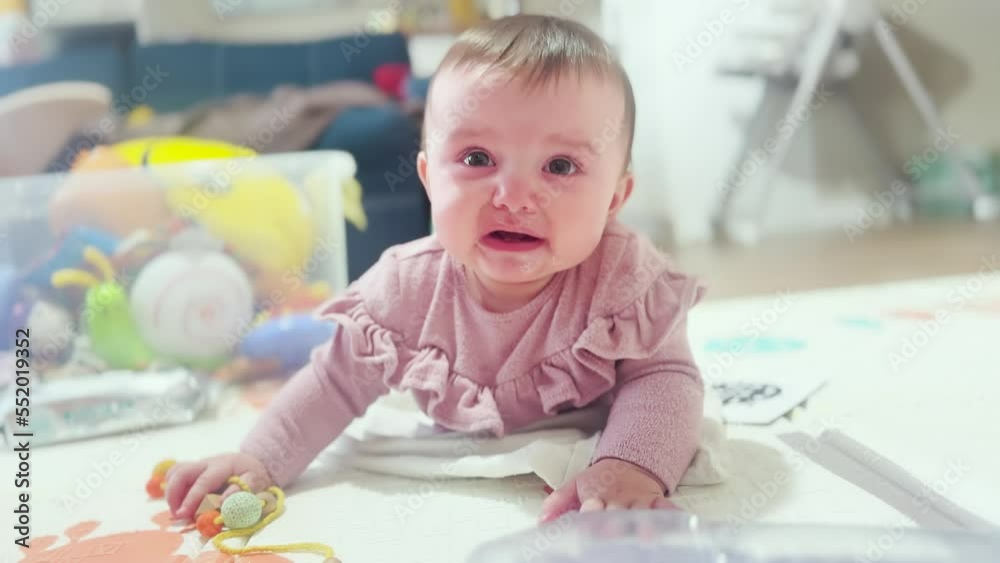 baby a newborn crying. little girl 6 months upset crying sad facial ...