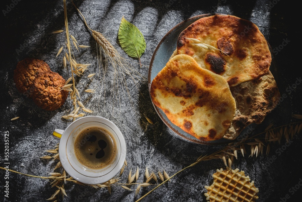 Dark background on the table. Exotic cuisine still life- indian food ...