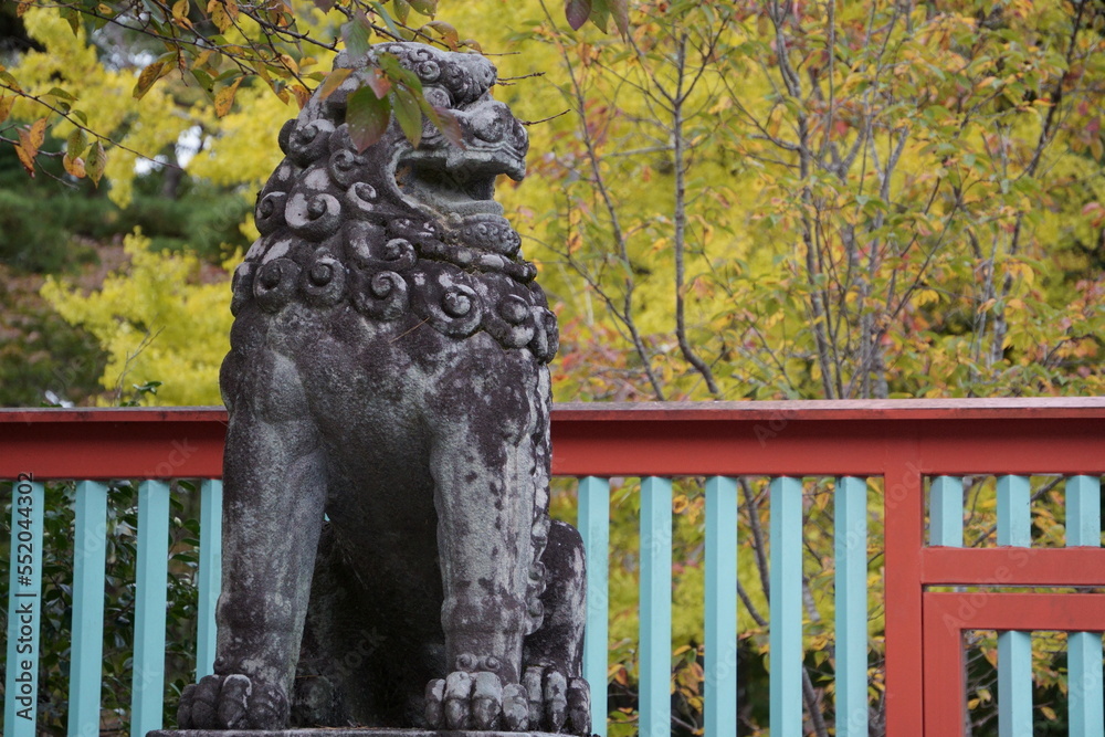 Komainu guarding the shrine. Komainu is a stone statue in the shape of ...