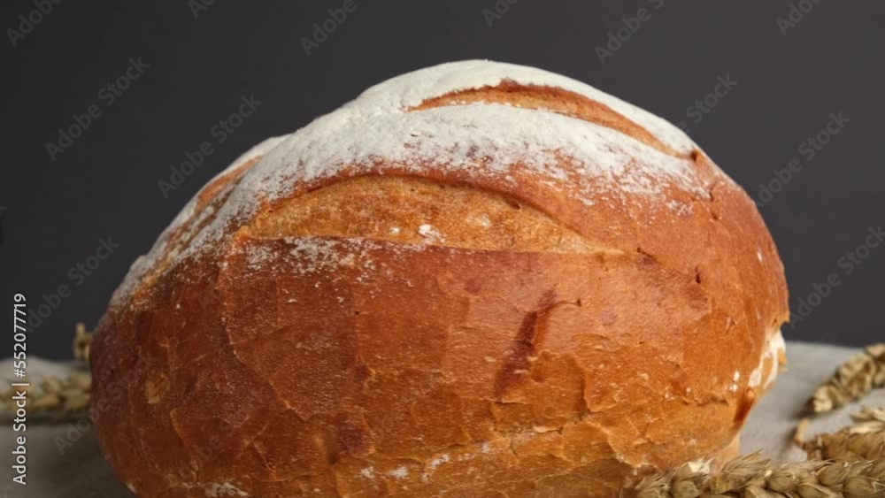 Baked bread. Loaf of Bread. Fresh Bakery Products on Wooden Board ...